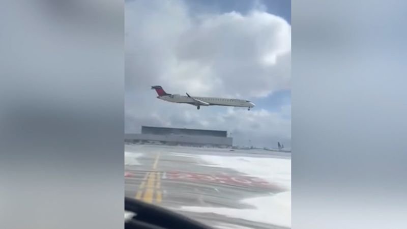 New video shows moment Delta plane flips upside down while landing ...