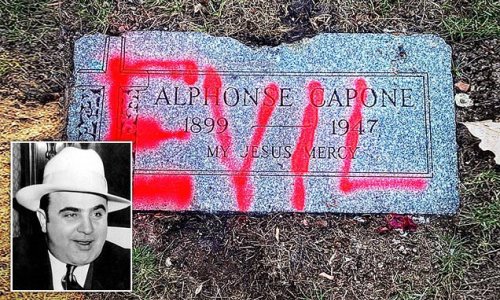 Notorious Chicago mobster Al Capone's grave is defaced with the words ...