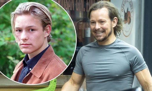 Former Coronation Street star Adam Rickitt shows off his long hair and ...