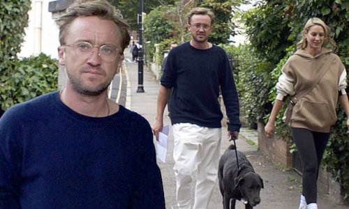 Harry Potter star Tom Felton cuts a casual figure in a sweater and ...