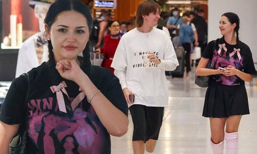 OnlyFans star Anna Paul, 23, looks youthful in a pleated schoolgirl ...