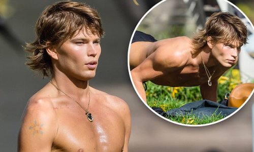 Jordan Barrett shows off his fit physique and muscular frame as he ...