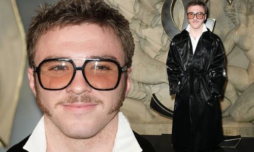 The 70s called... Rocco Ritchie sports retro style sideburns and ...