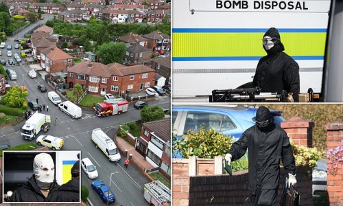 Emergency crews in protective suits attend scene after major incident ...