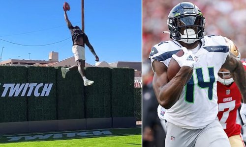 DK Metcalf produces an 'INSANE' and effortless leaping one-handed catch ...