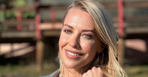 Laura Hamilton 'gets hotter every day' as she wows fans in plunging ...