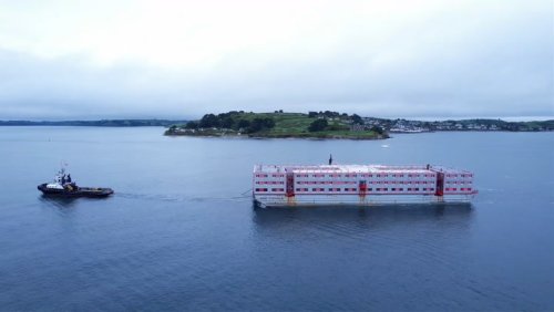 Watch: Three-storey barge expected to house migrants arrives at ...