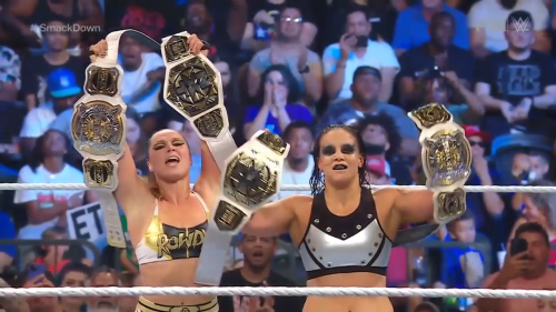 Ronda Rousey & Shayna Baszler defeat Alba Fyre & Isla Dawn to claim the title of the new Unified ...