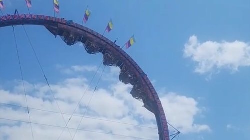 Photos show Wisconsin carnival riders stuck upside down for hours ...