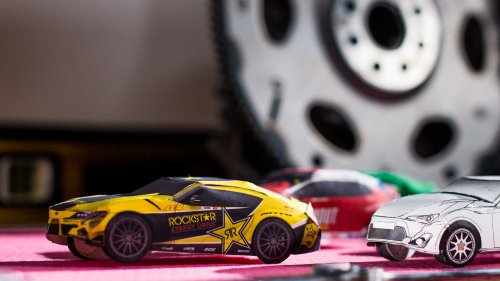 Watch A Toyota Supra Papercraft Model Drift Around A Race Shop | Flipboard