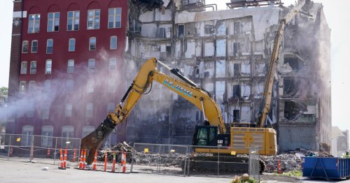 Demolition of partially collapsed Iowa building begins as owner pleads ...