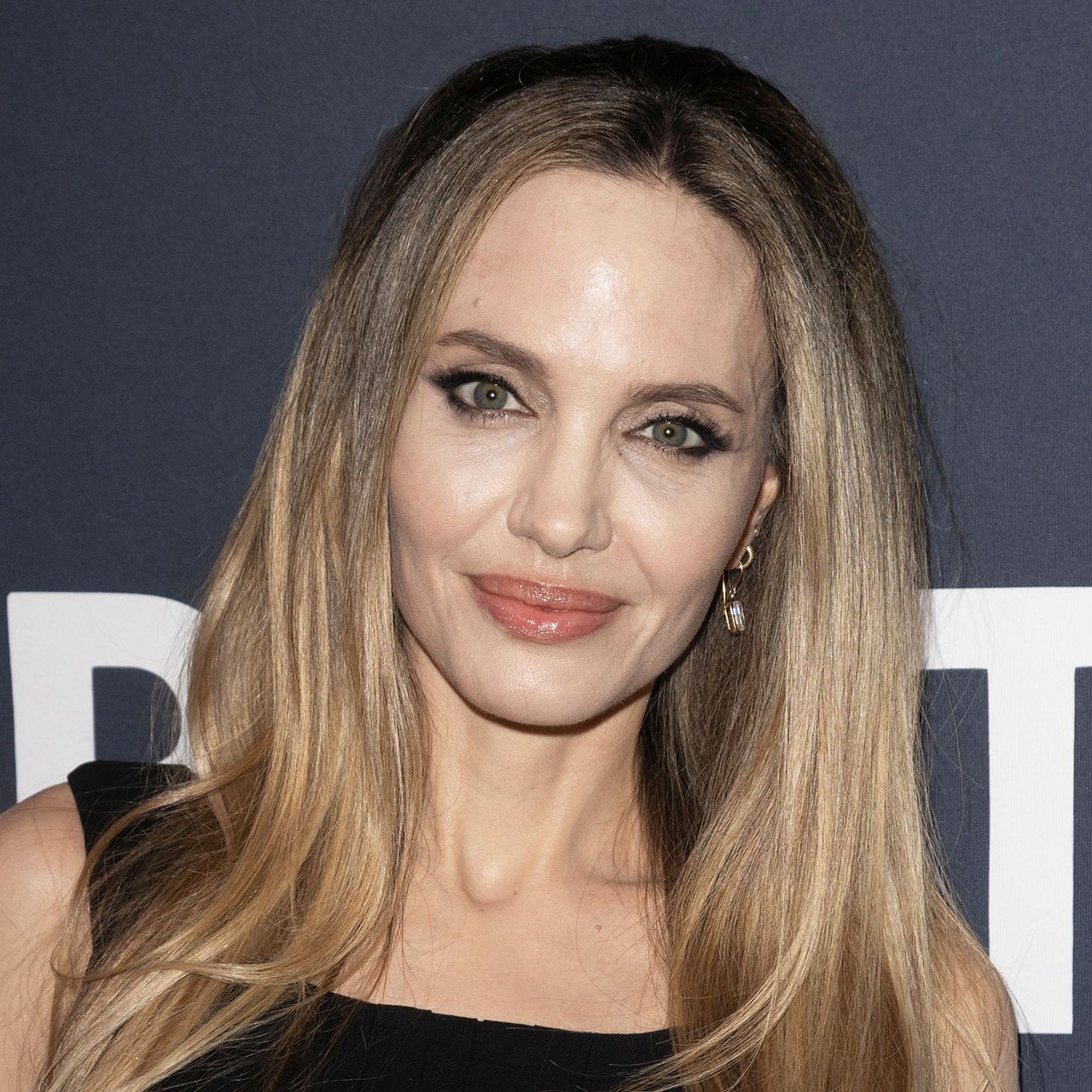 Angelina Jolie Gives A Glimpse Of Her Chest Tattoo Underneath A Power ...