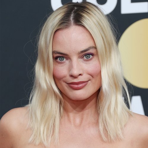 Be careful! Margot Robbie risks a wardrobe malfunction as she's caught ...