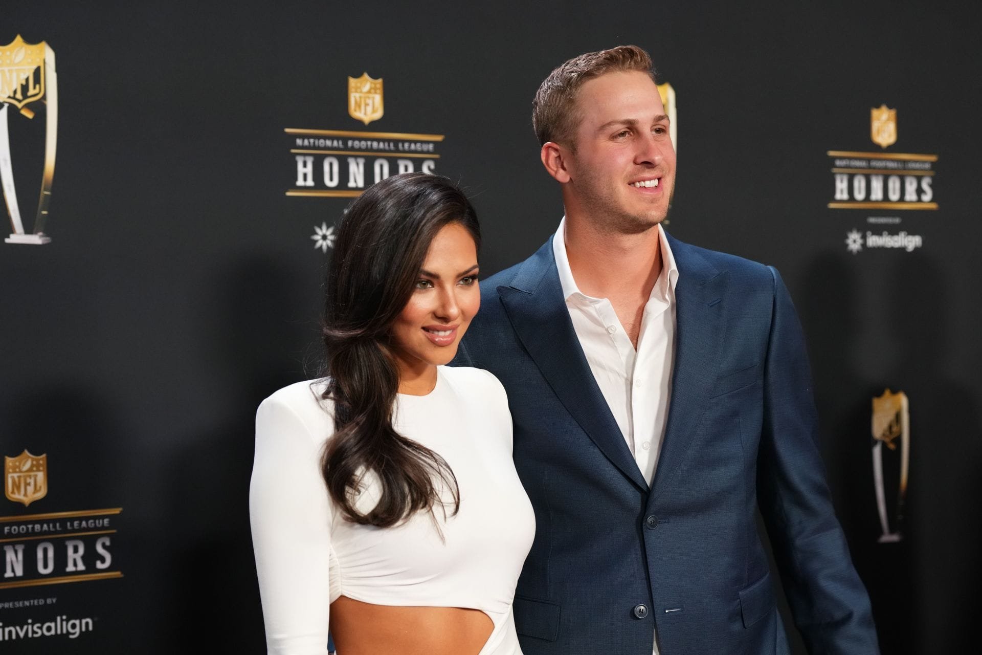 Jared Goff’s wife Christen balances glass on baby bump in swimsuit ...