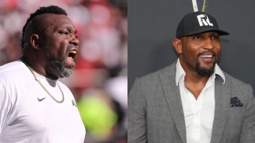 Buffs coach Warren Sapp wears a Colorado cap with Tampa Bay sweatshirt ...