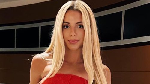 Jess Gardner wows in leggy strapless red carpet dress as Huskers fans ...