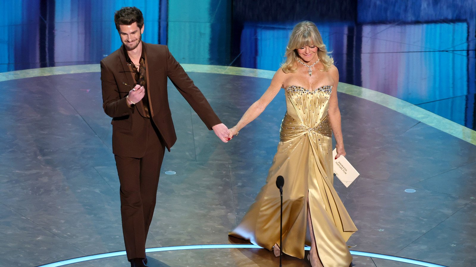 The Tragic Reason Andrew Garfield Held Goldie Hawn's Hand At The 2025 ...