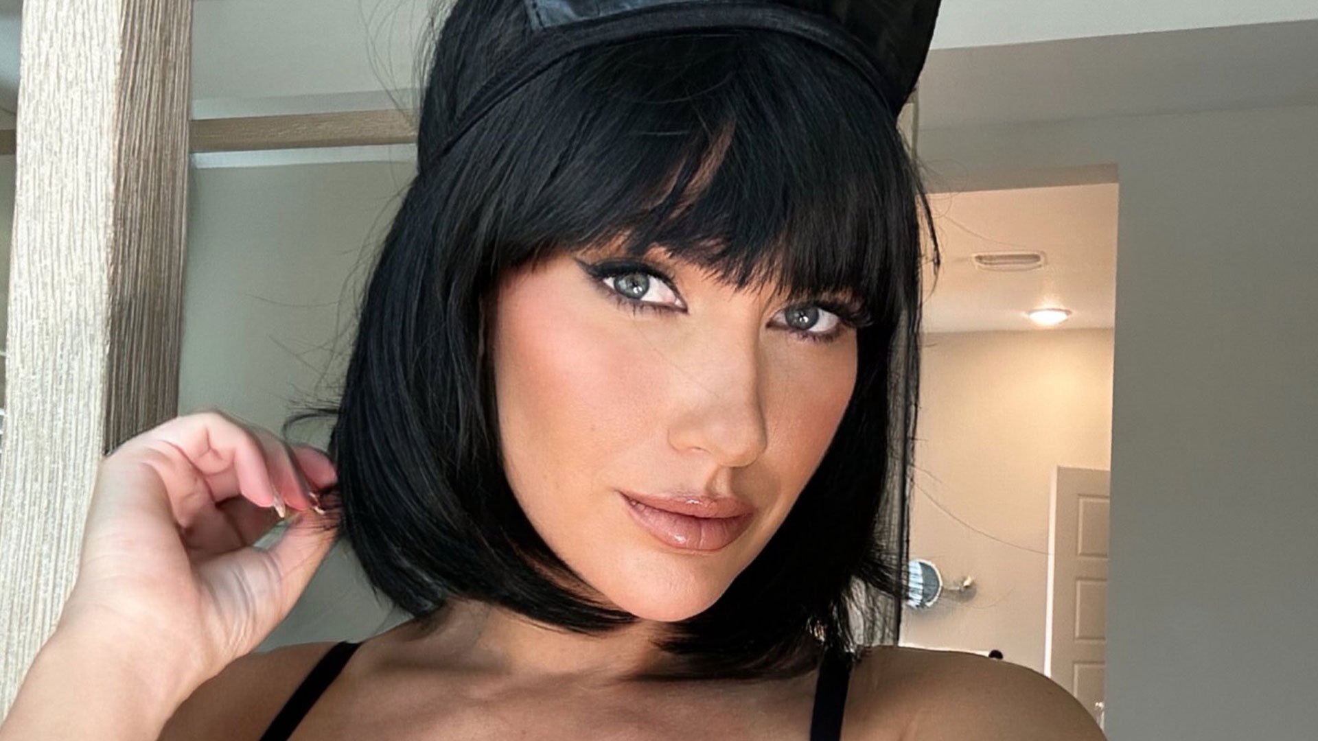 Paige Spiranac shows off tan lines as she goes braless to model risque ...