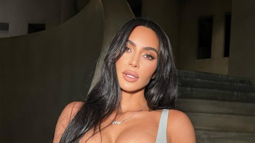 Kim Kardashian Nearly Spills Out Of Tiny Bra Top As She Shows Off